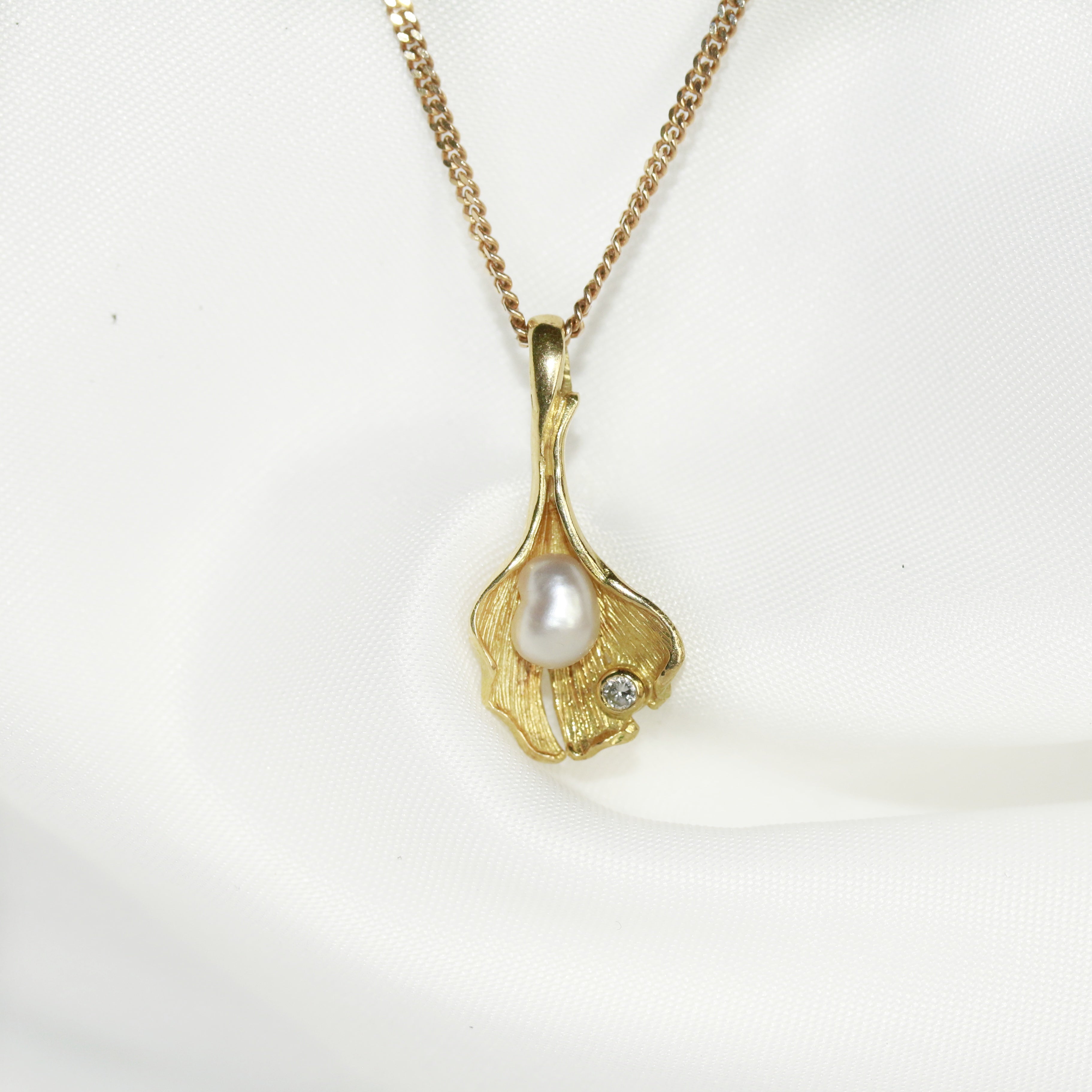 Pearl and Diamond leaf pendant – Powells Jewellery